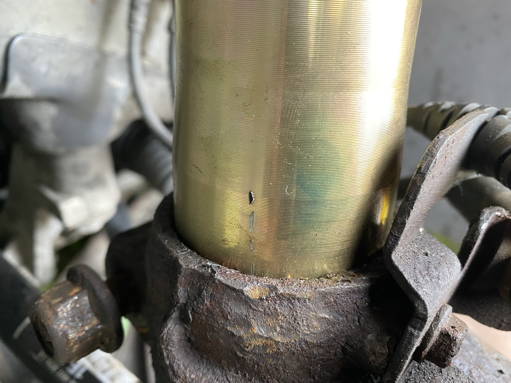 Managed to damage my front left coilover : r/MechanicAdvice